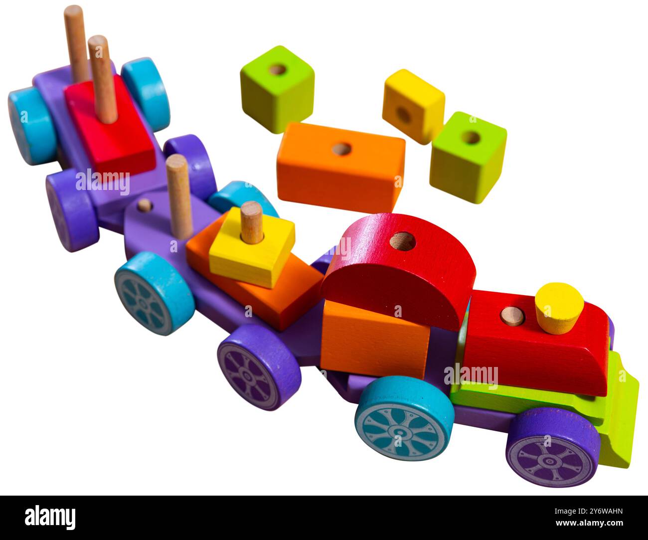 Colorful wooden toy stacking train with wagons from blocks Stock Photo ...