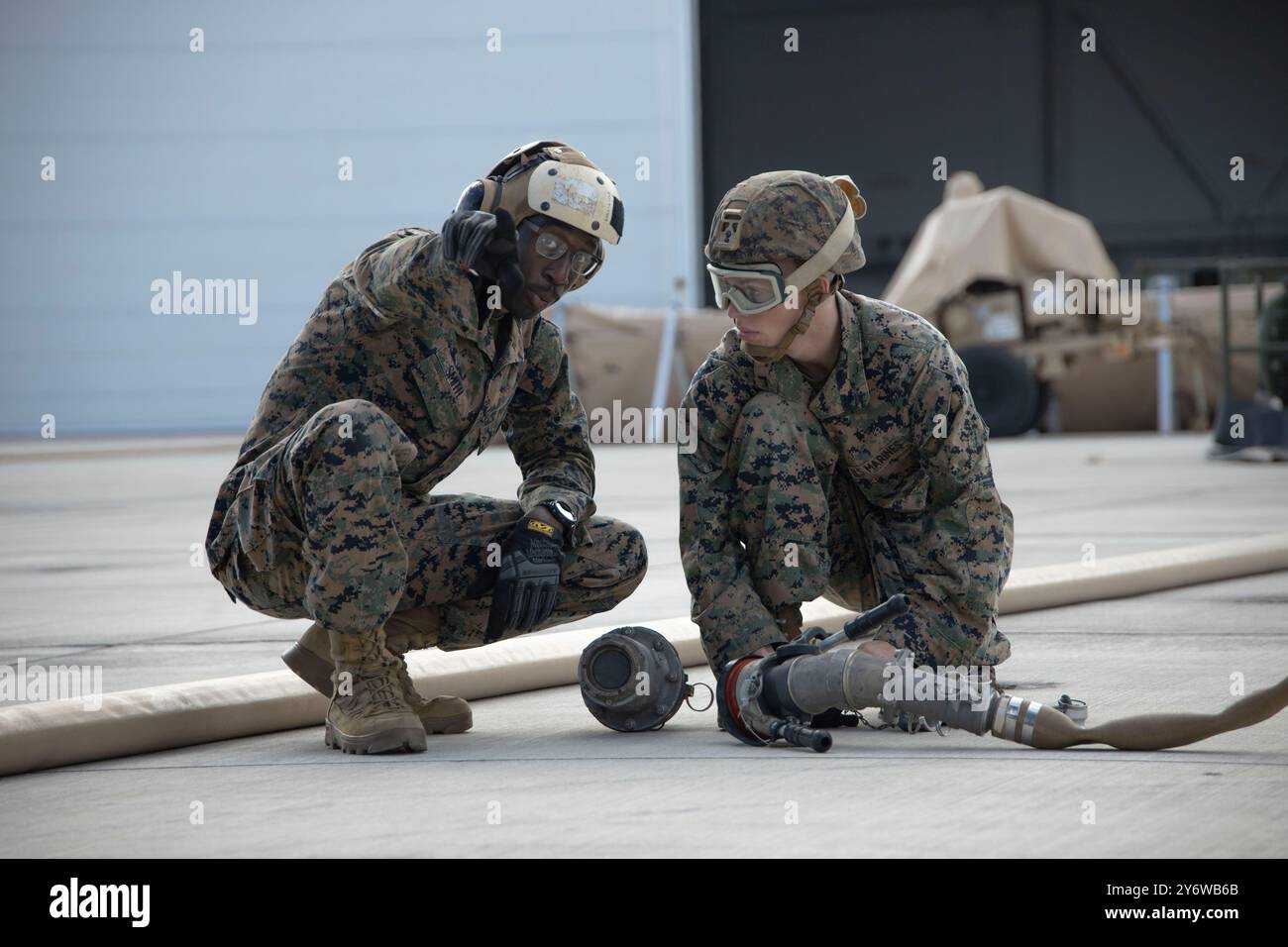 U.S. Marine Corps Sgt. Walid D. Smith, left, and Pfc. Hayden C. Bowen ...