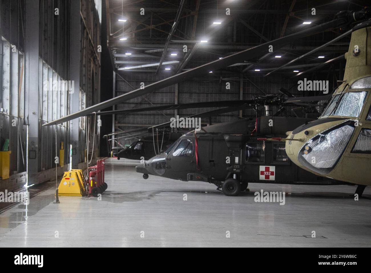 A U.S. Army CH-47 Chinook and UH-60 Black Hawk helicopters assigned to ...