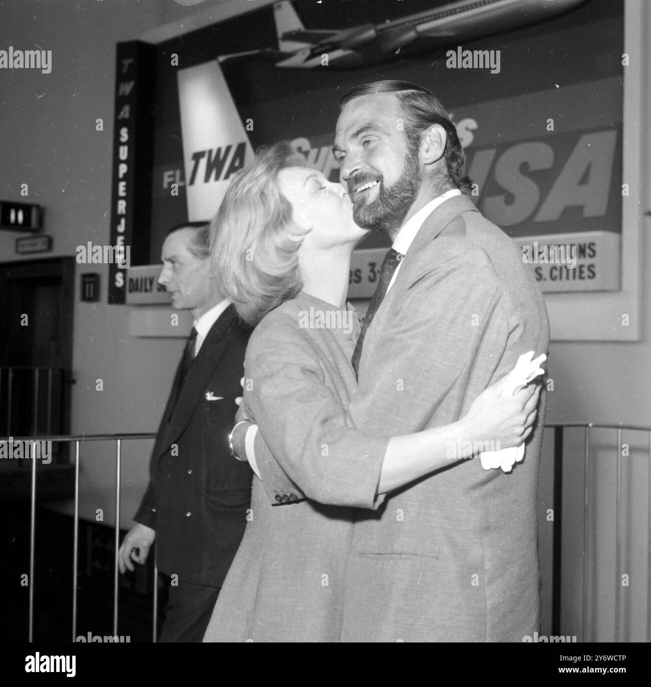 ACTOR STANLEY BAKER WITH HIS WIFE AT LONDON AIRPORT 27 APRIL 1961 Stock ...