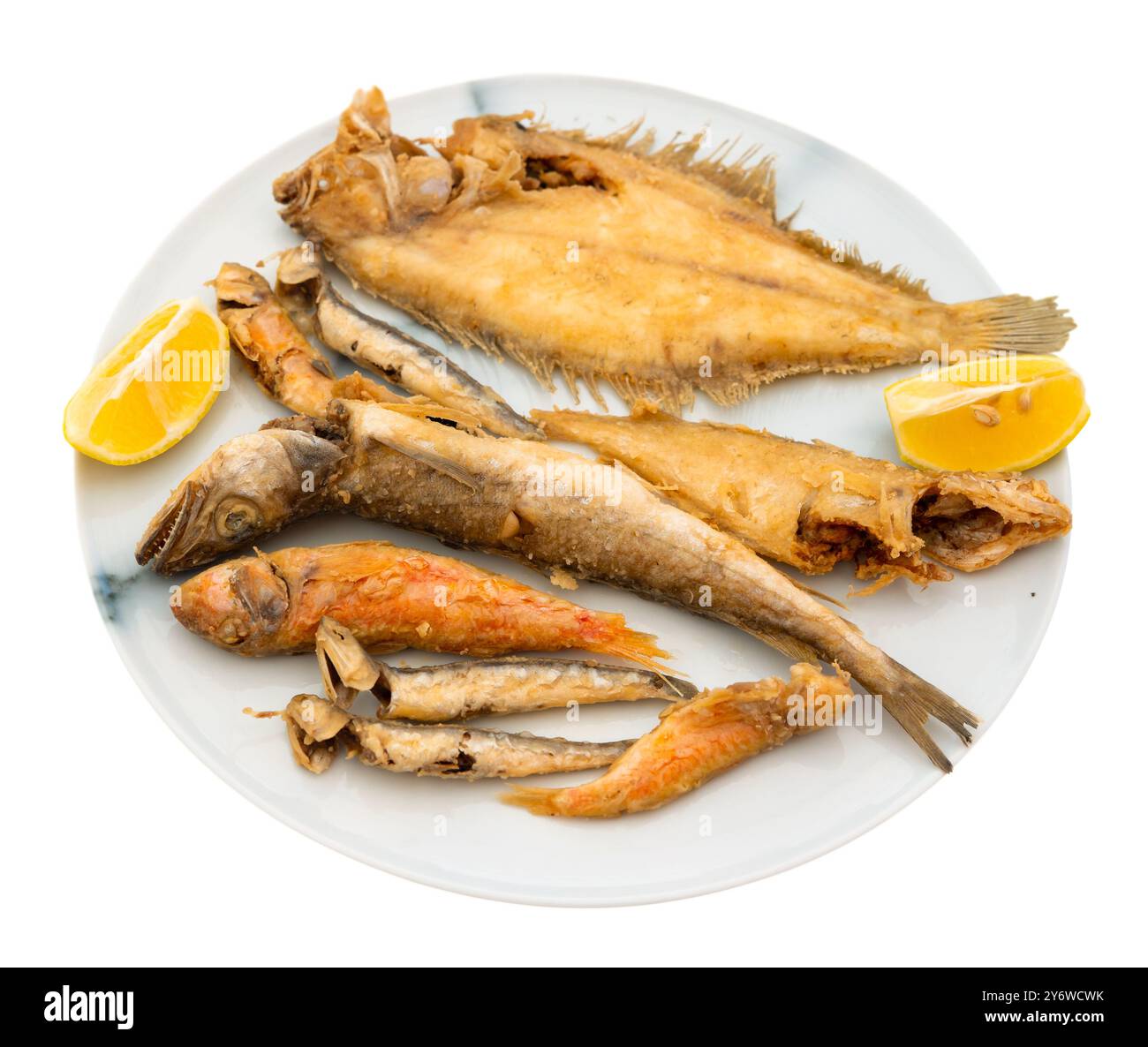 On white background, there is plate with fried fish of different ...