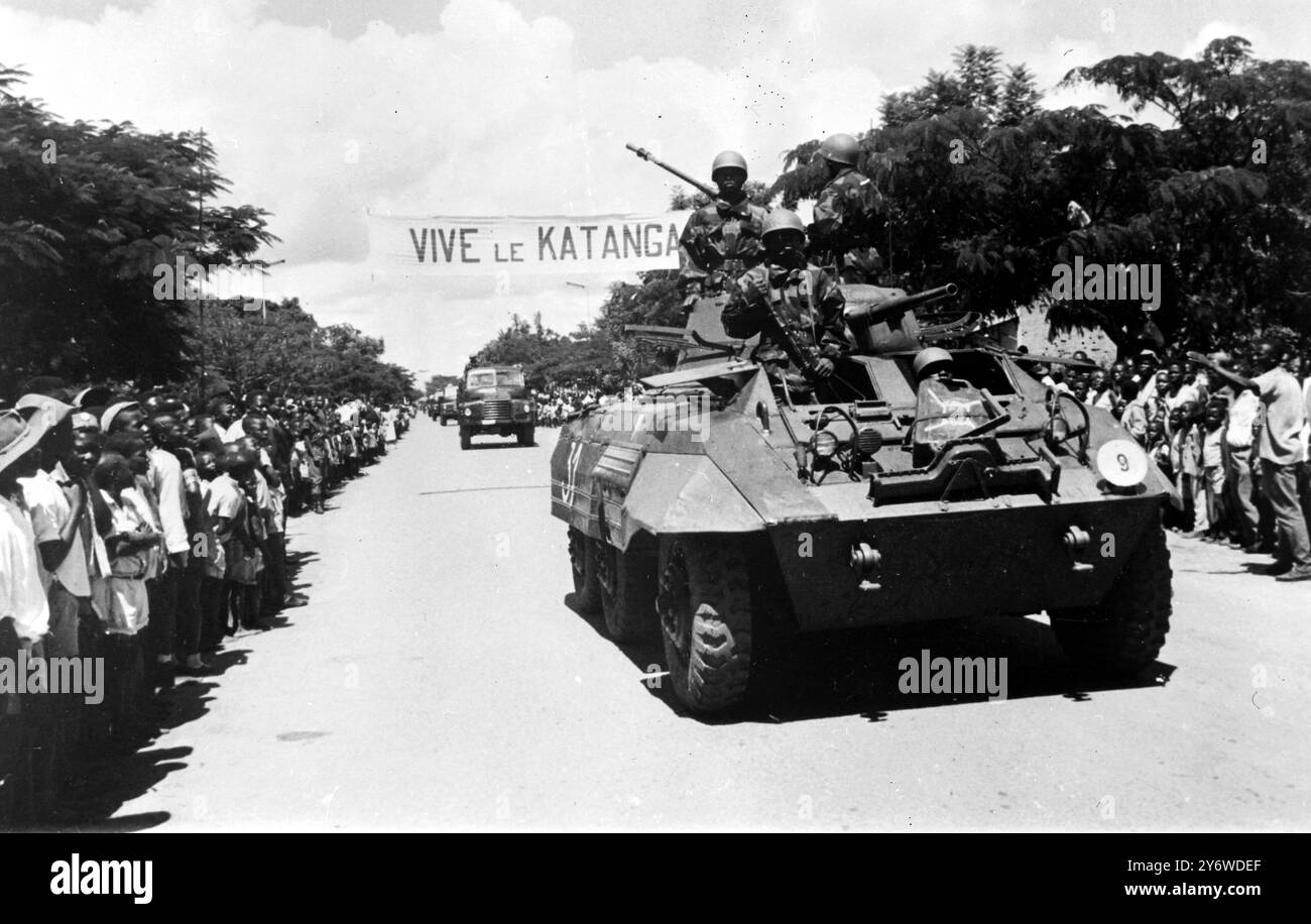 ARMY TANKS AND CARS RUMBLE THROUGH STREET KATANGA 22 APRIL 1961 Stock ...