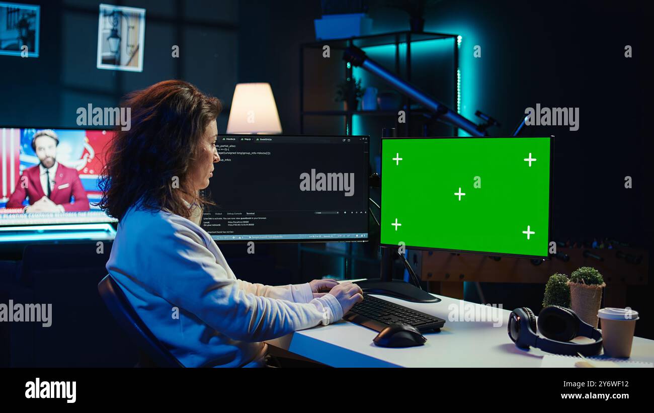 Developer Doing Software Debugging On Green Screen Pc At Home Checking Lines Of Code Displayed