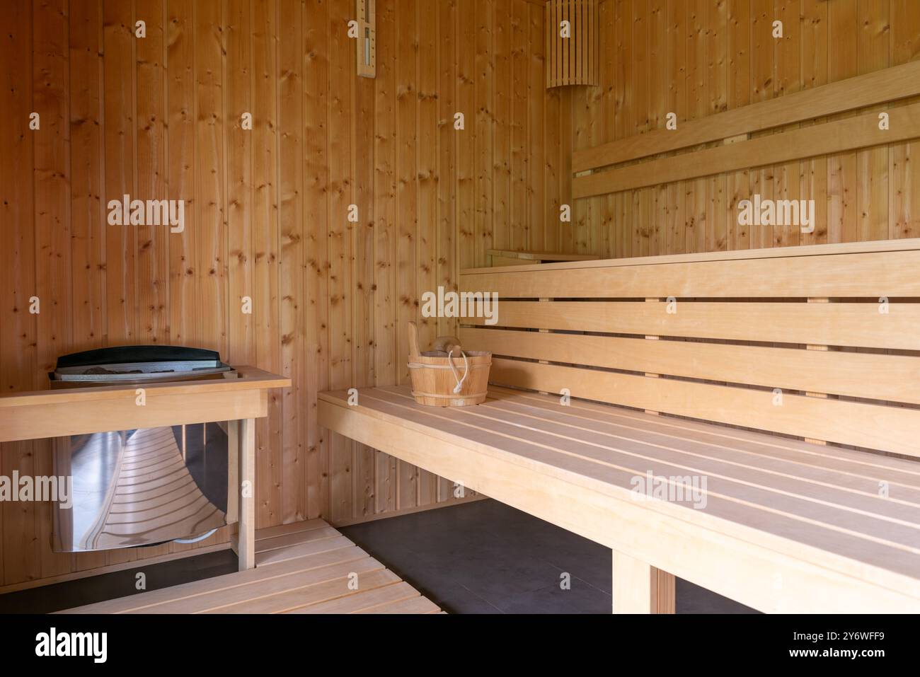 Wooden Sauna With Benches. The sauna is empty. The wooden benches ...