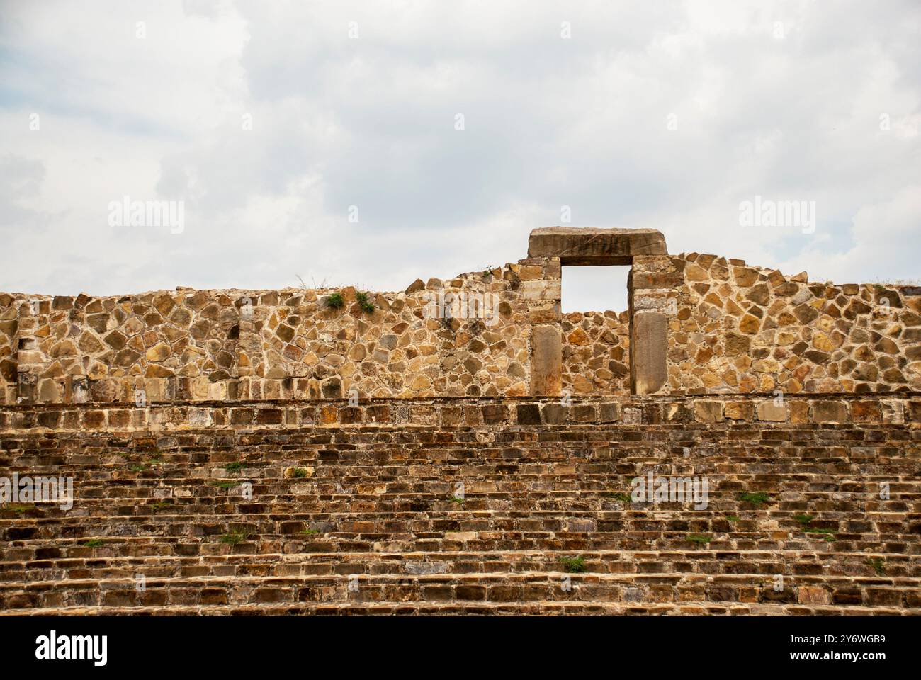 A wall of the archaeological site of Mitla. A touristic archeological ...