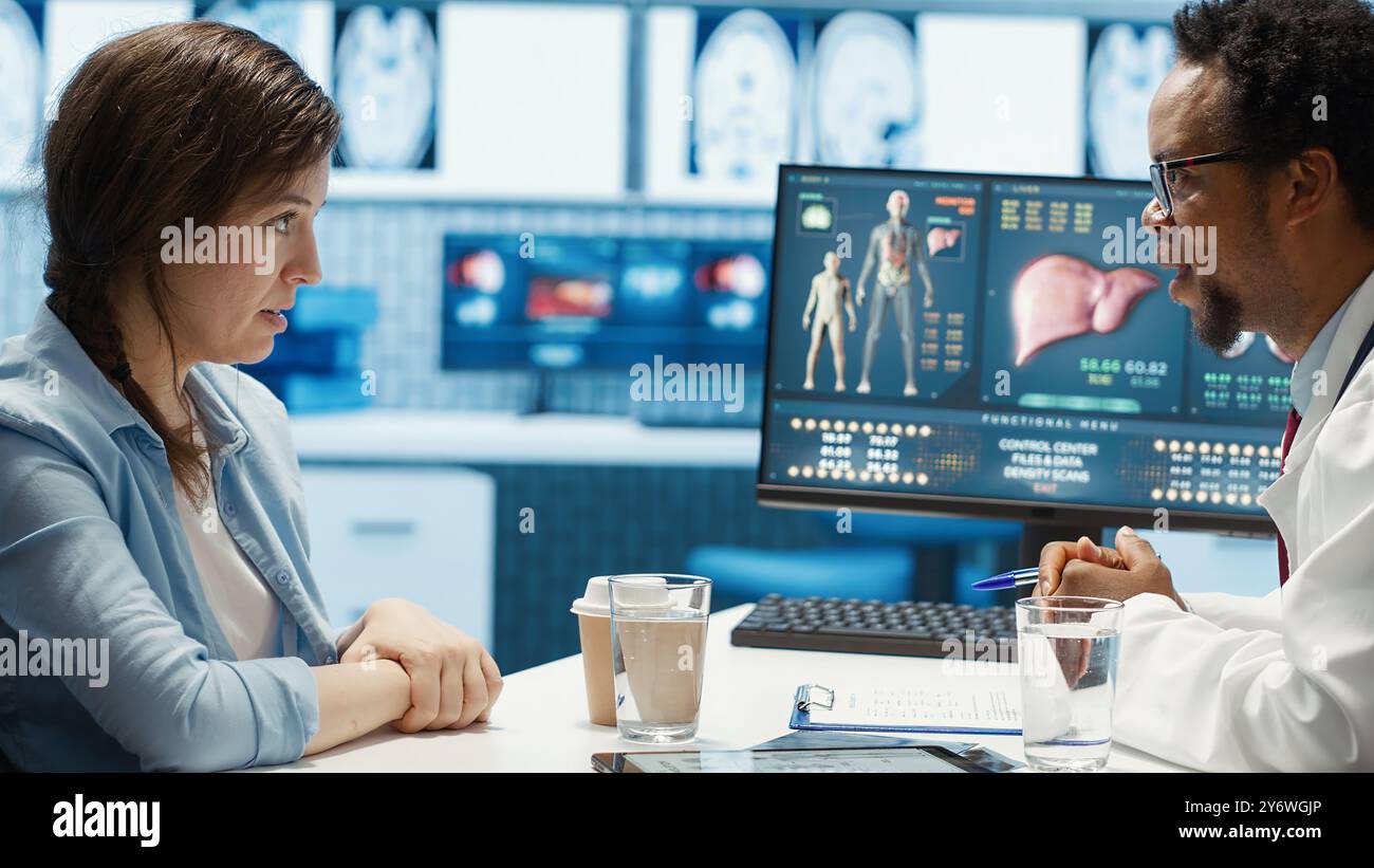 African american medic doing a scan interpretation with female patient ...