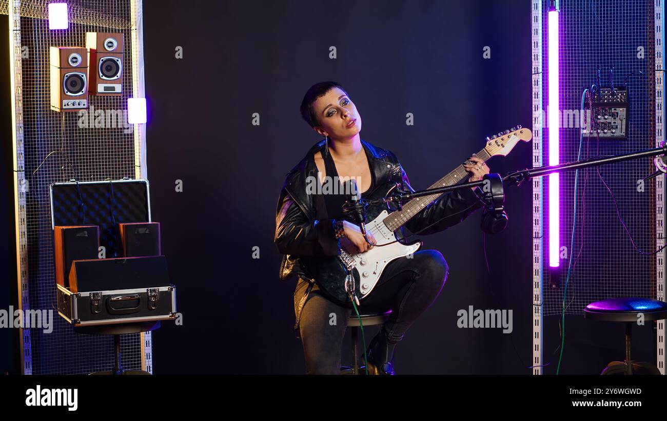 Confident female singer delivers a powerful vocal performance in a live ...