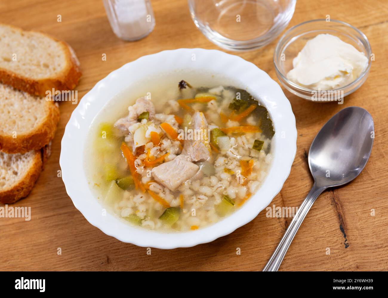 Popular Russian soup rassolnik with pickled cucumbers, brine and pearl ...
