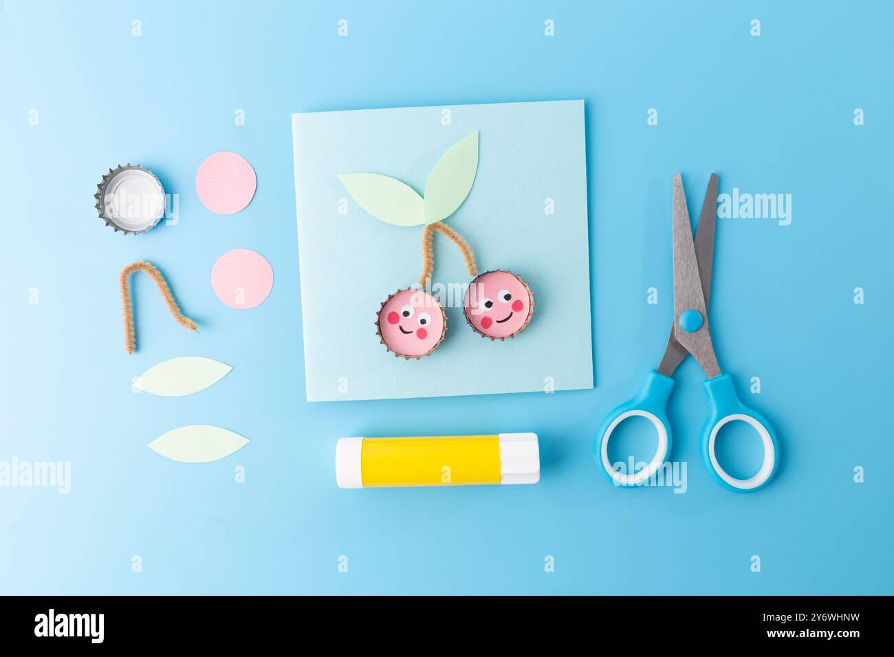 Cherry themed card template in blue with scissors on paper, part of a ...