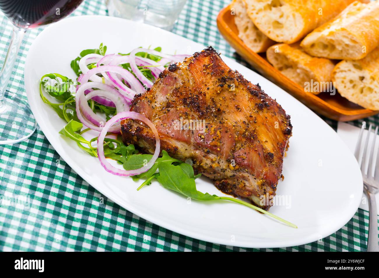 Roasted rack of pork Stock Photo - Alamy