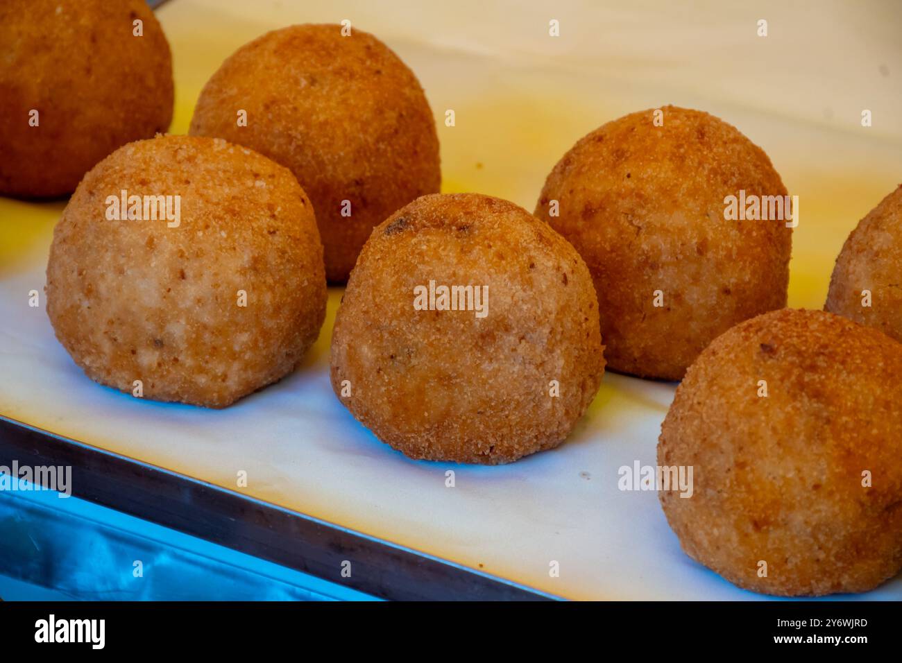Sicilian street food, deep fried rice croquettes with different ...