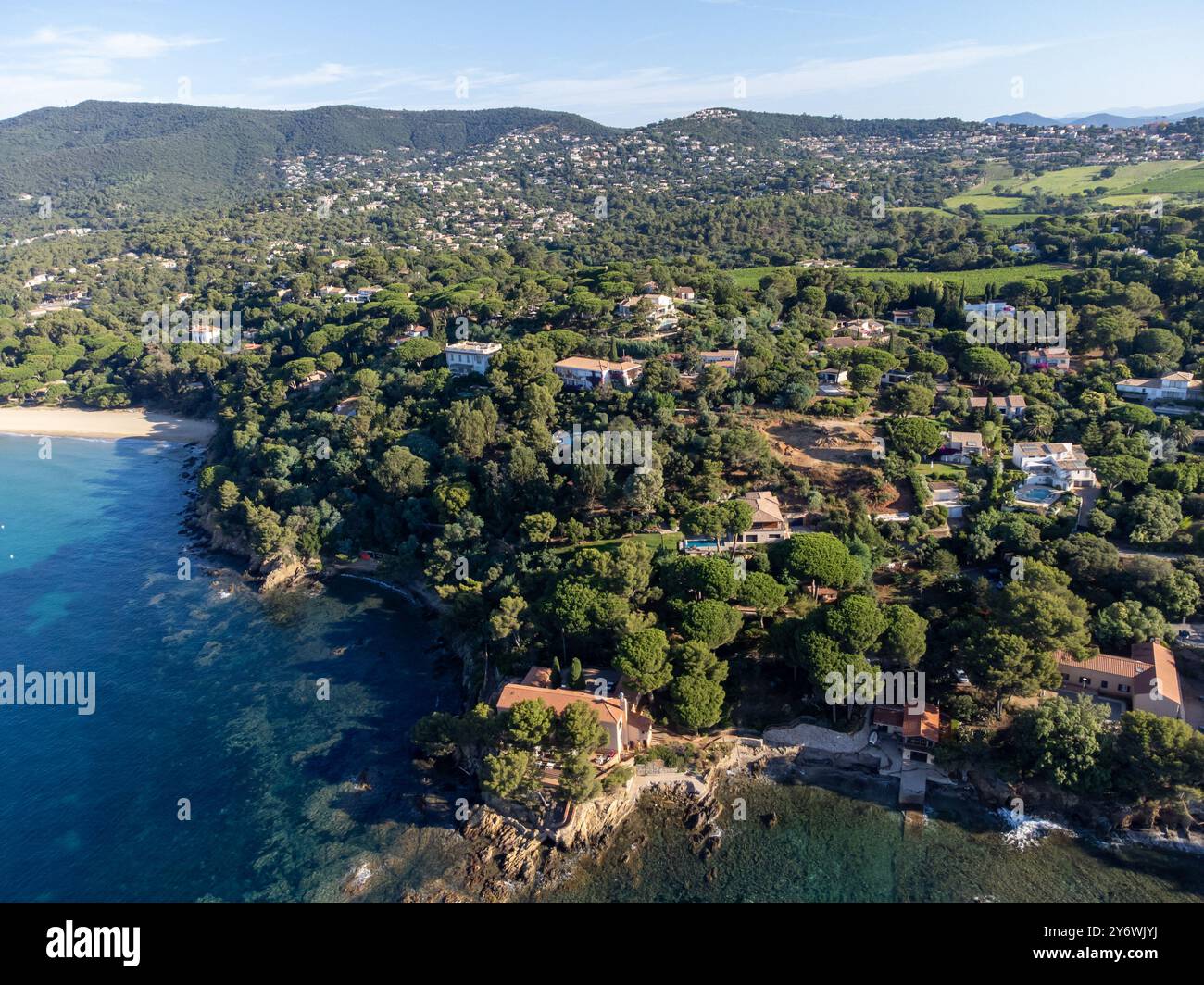 Aerial view on boats, crystal clear blue water of Plage du Debarquement ...