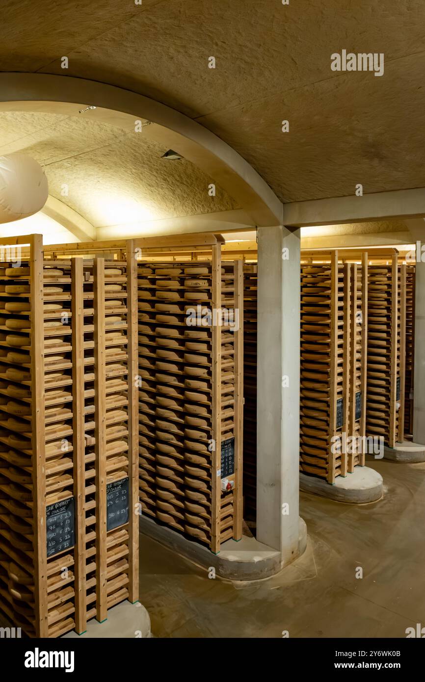 Aging rooms with many shelves in cheese caves, central location for ...