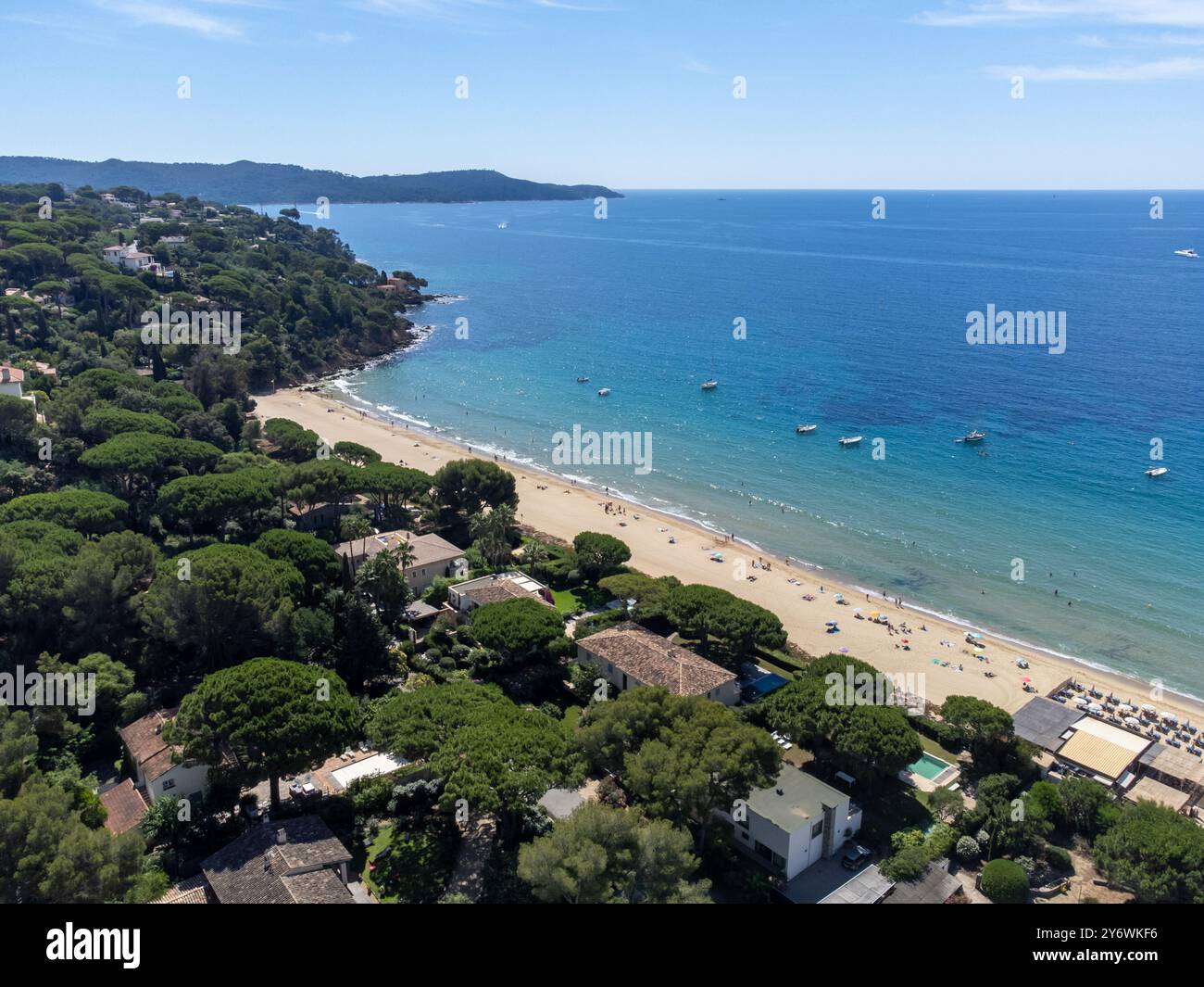 Aerial view on boats, crystal clear blue water of Plage du Debarquement ...