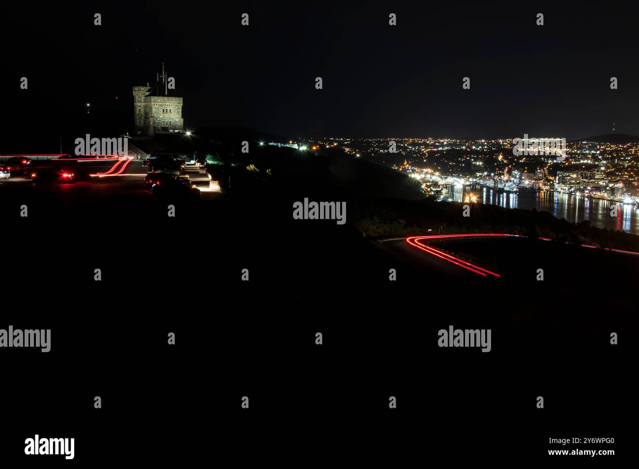 Car trails on Signal Hill Road and Cabot Tower at night in St. John's ...