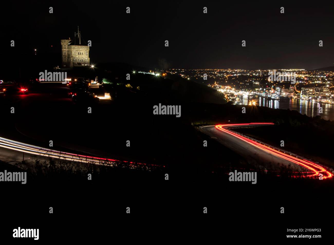 Car trails on Signal Hill Road and Cabot Tower at night in St. John's ...