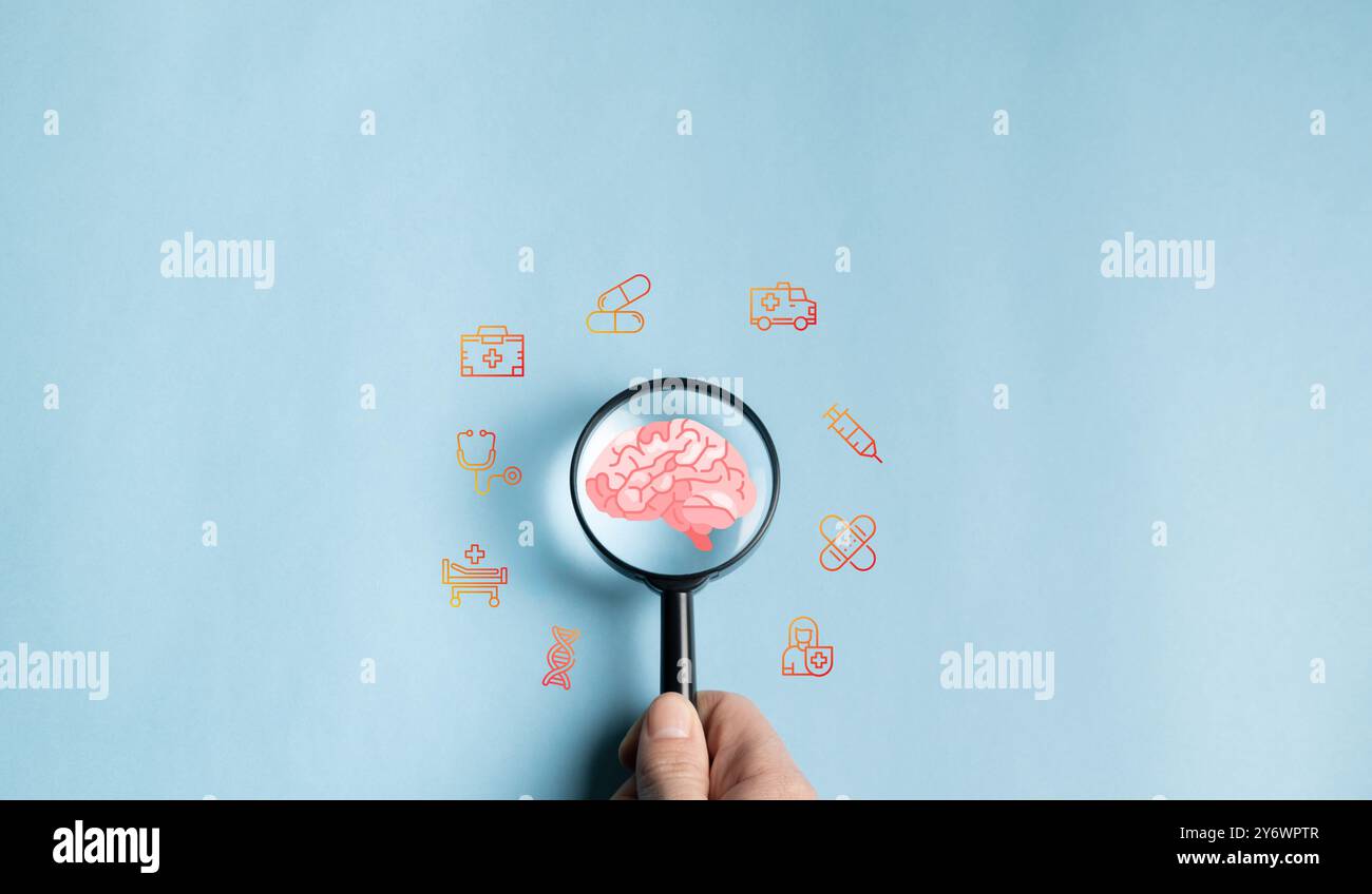 Magnifying glass focuses on human brain icon, prevention, health care ...