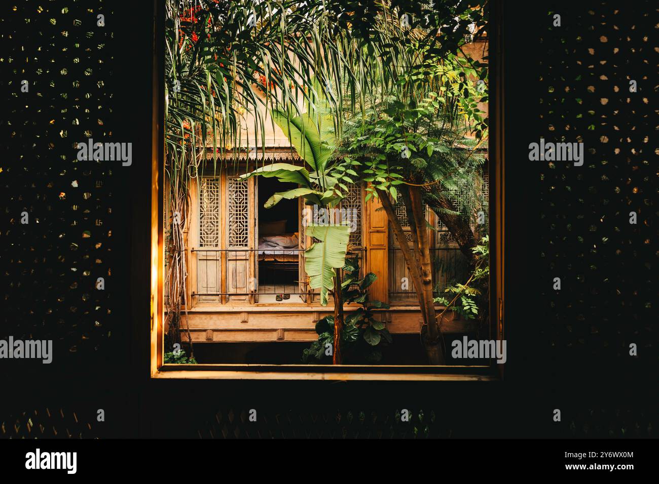 View from a traditional moroccan riad, interior wooden windows, luxury ...