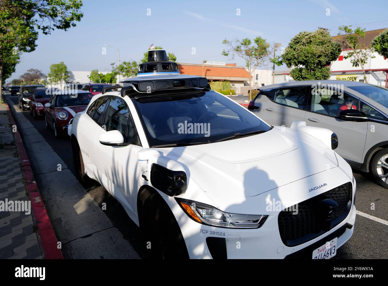 Waymo Jaguar self-driving car equipped with sensors and cameras, parked ...