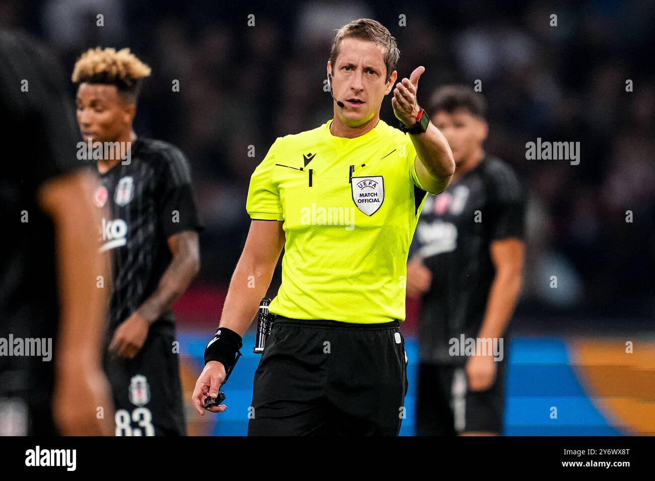AMSTERDAM, NETHERLANDS - SEPTEMBER 26: Referee John Brooks gestures ...