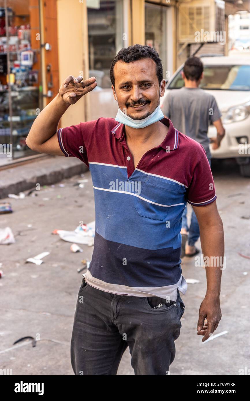 RIYADH, SAUDI ARABIA - DECEMBER 1, 2021: Man at a market in Almarqab ...