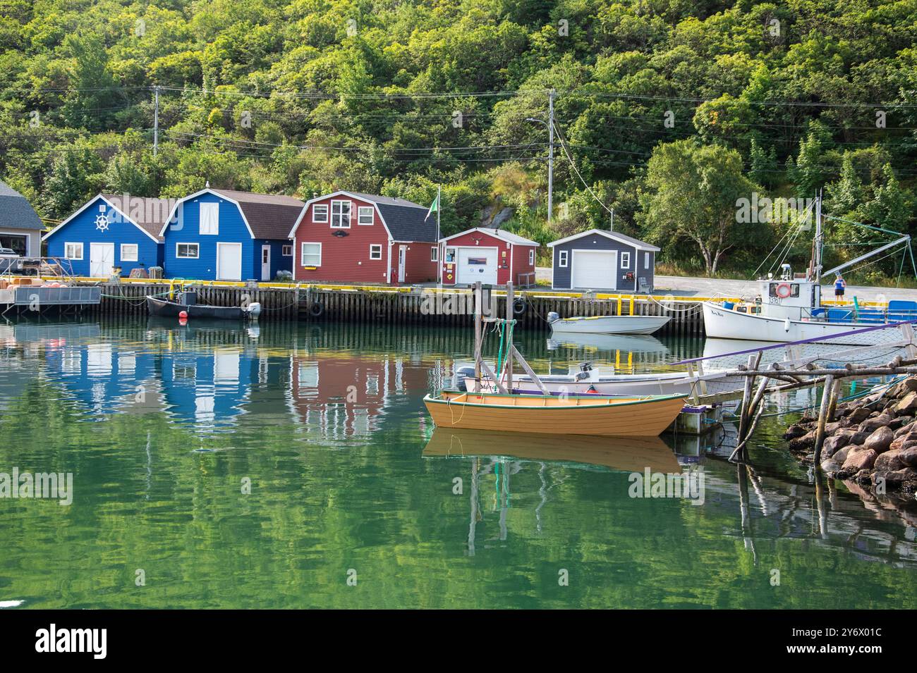 Colorful boat sheds on the dock at Petty Harbour–Maddox Cove ...