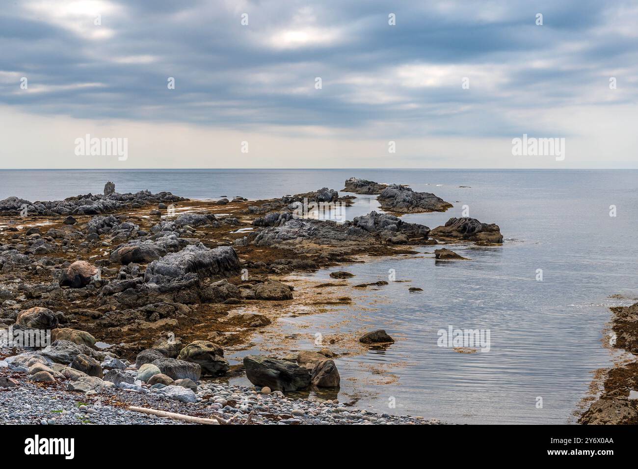 Rocky outcrop into Atlantic Ocean Stock Photo - Alamy