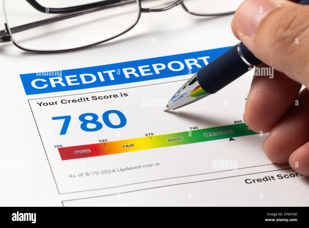 Credit score report sheet with pen and eye glasses Stock Photo - Alamy