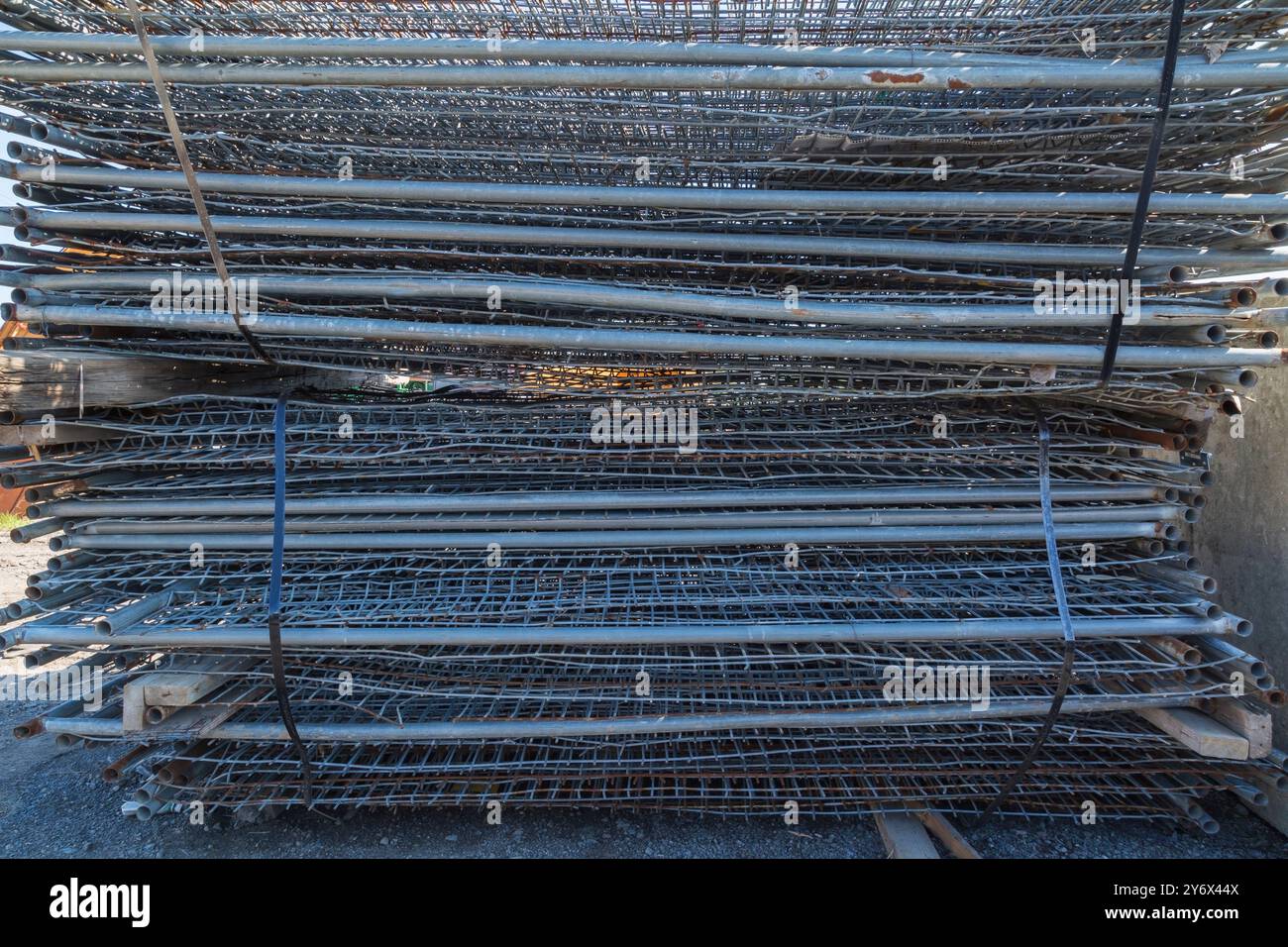 Stacked heavy duty galvanized steel and wire mesh security fences Stock ...