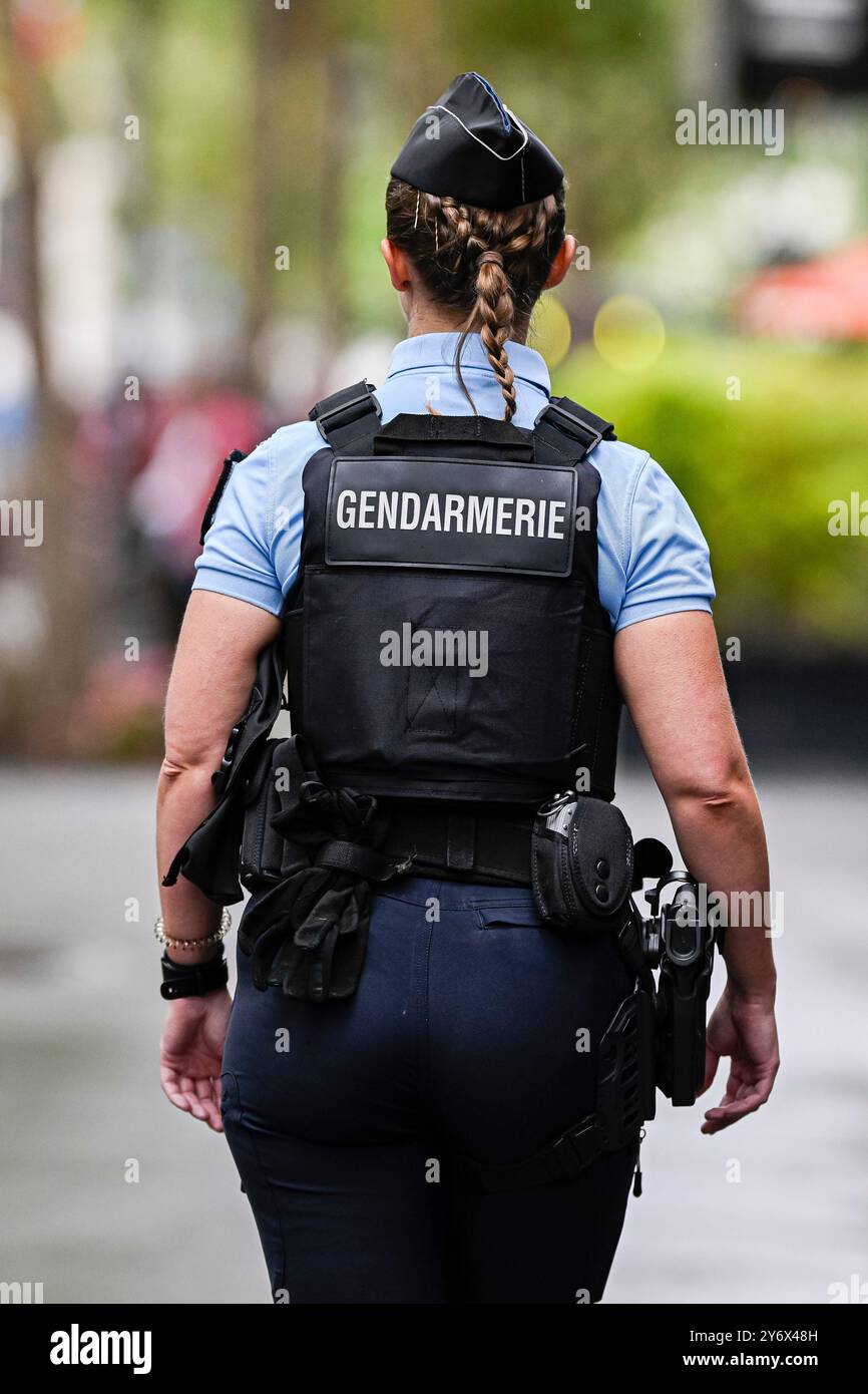 Illustration picture showing a female police officer (woman) with ...