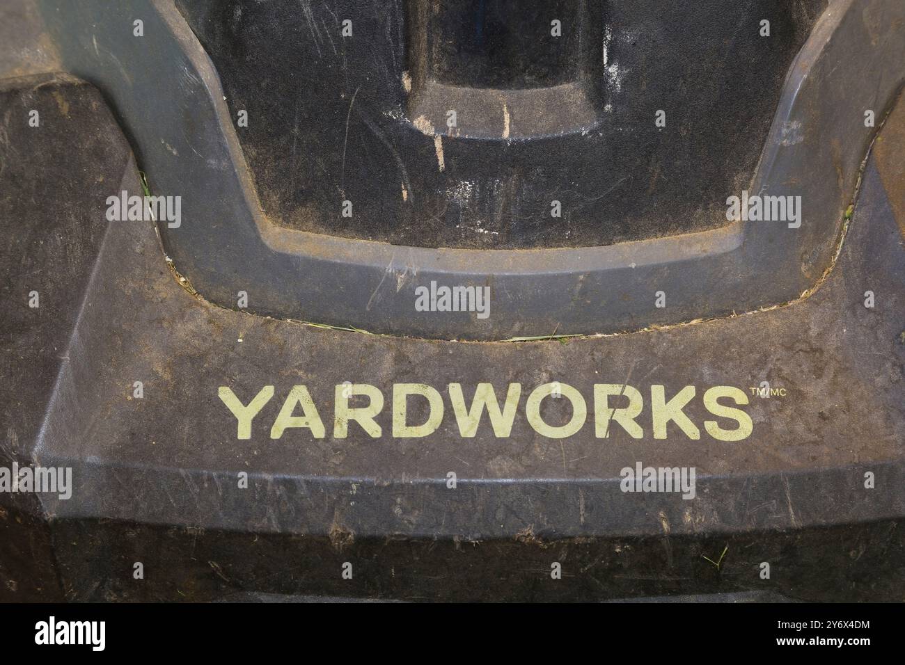 Close-up of Yardworks brand name logo on front end of electric lawn ...