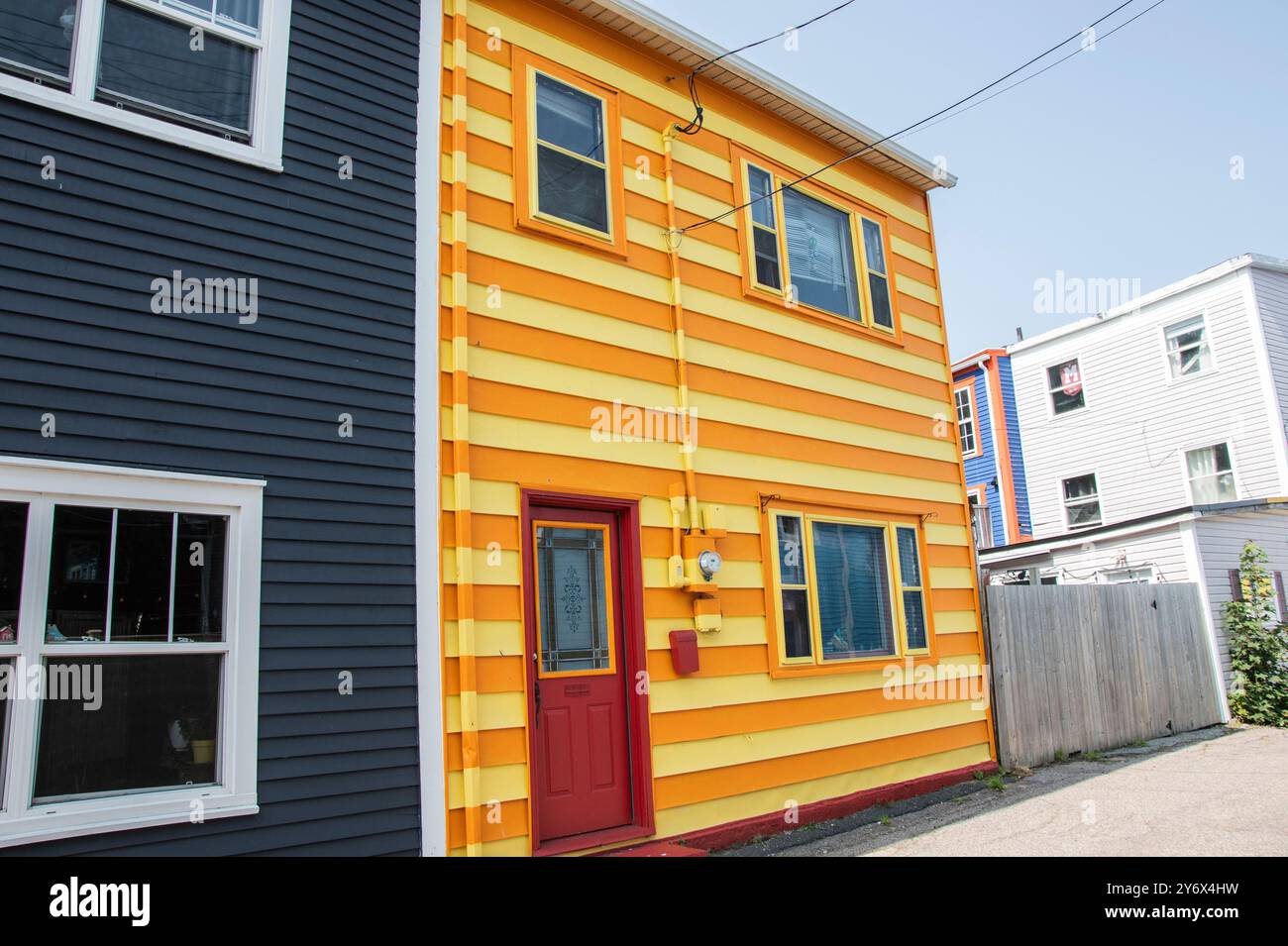 Yellow and orange striped jellybean row house in downtown St. John's ...