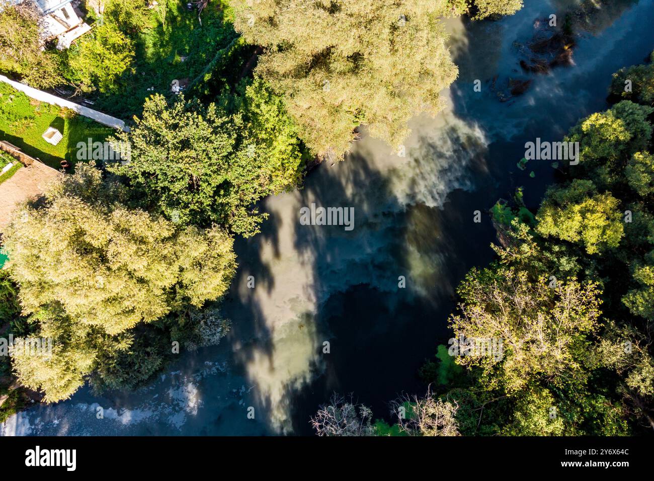 Aerial view of polluted riverbed, sewage discharge into river Stock ...