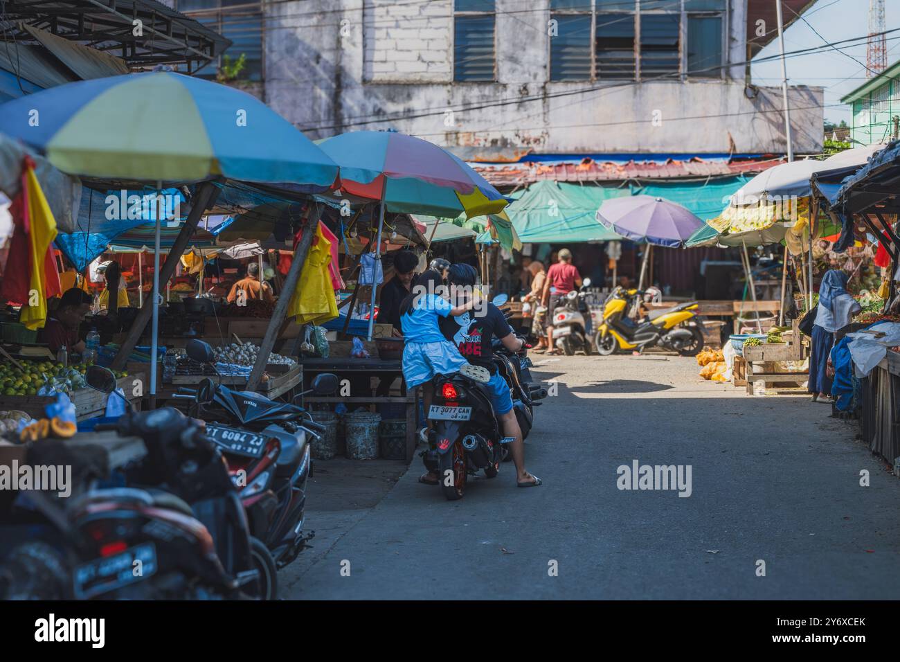 Balikpapan, Indonesia - June 26th, 2024. They are shopping at the ...