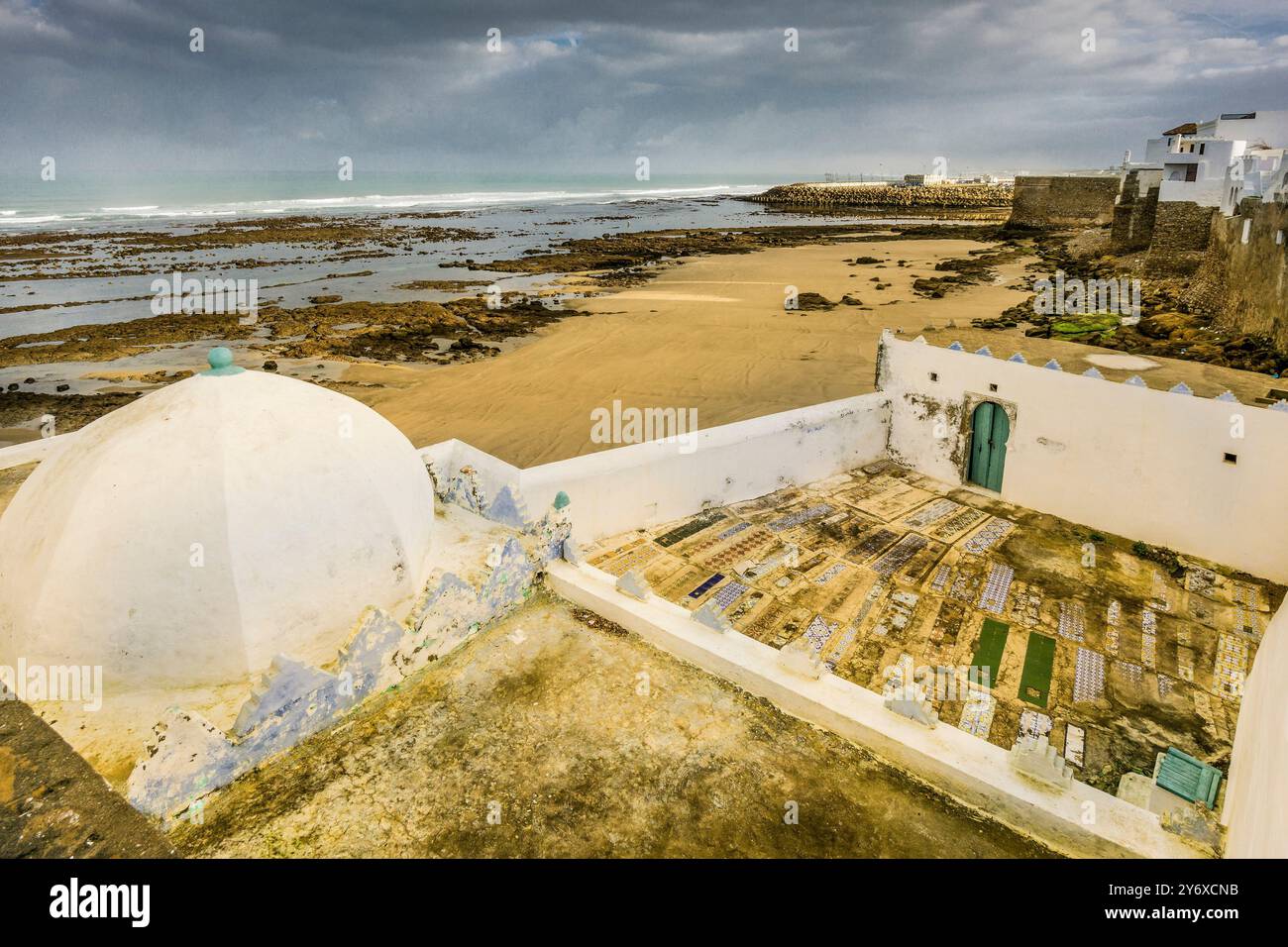 old Muslim cemetery, with multi-colored ceramic tombs, Assilah, Morocco ...