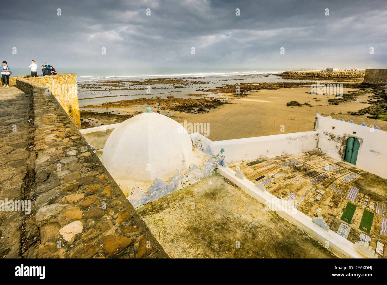 old Muslim cemetery, with multi-colored ceramic tombs, Assilah, Morocco ...