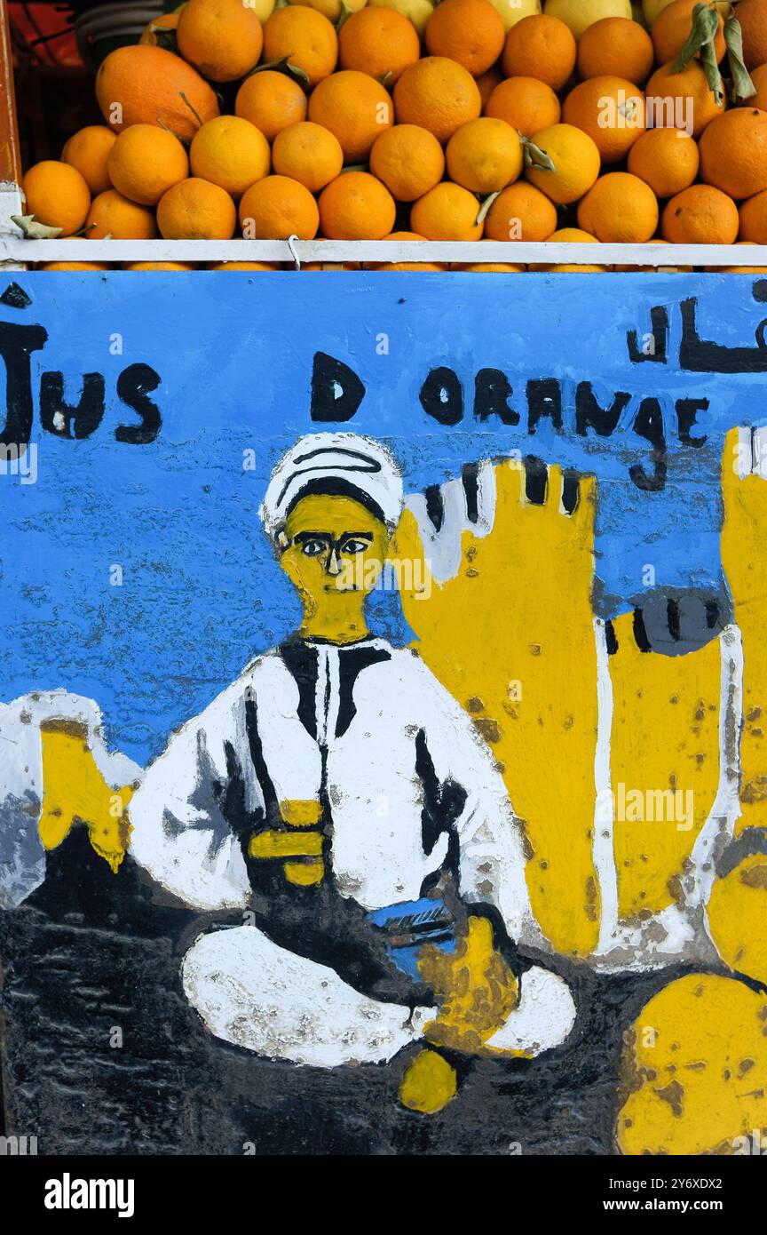 Poster advertising sale of orange juice, Berber market. Talmoklate ...