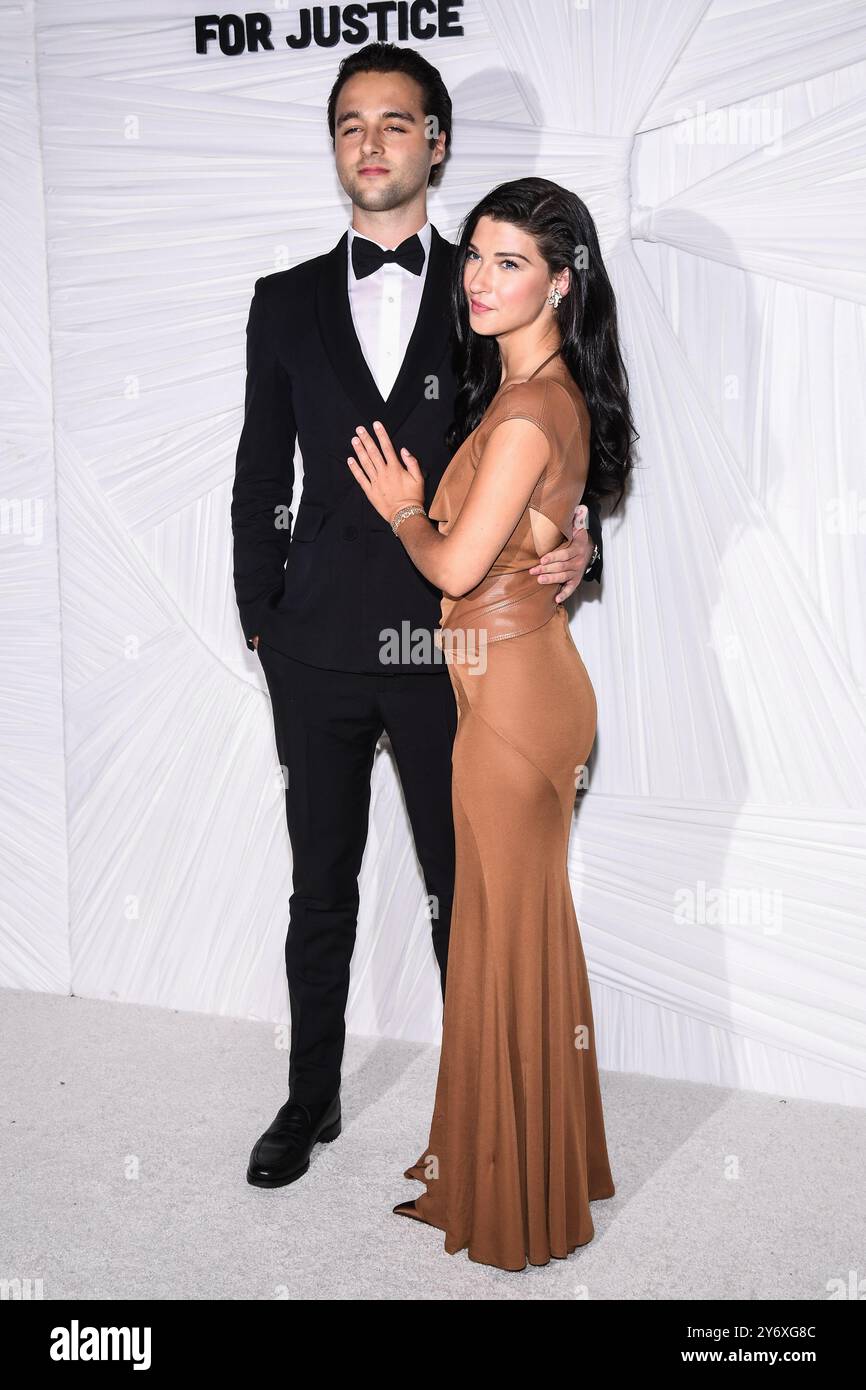New York, USA. 26th Sep, 2024. Arthur Donald and Phoebe Gates walking ...