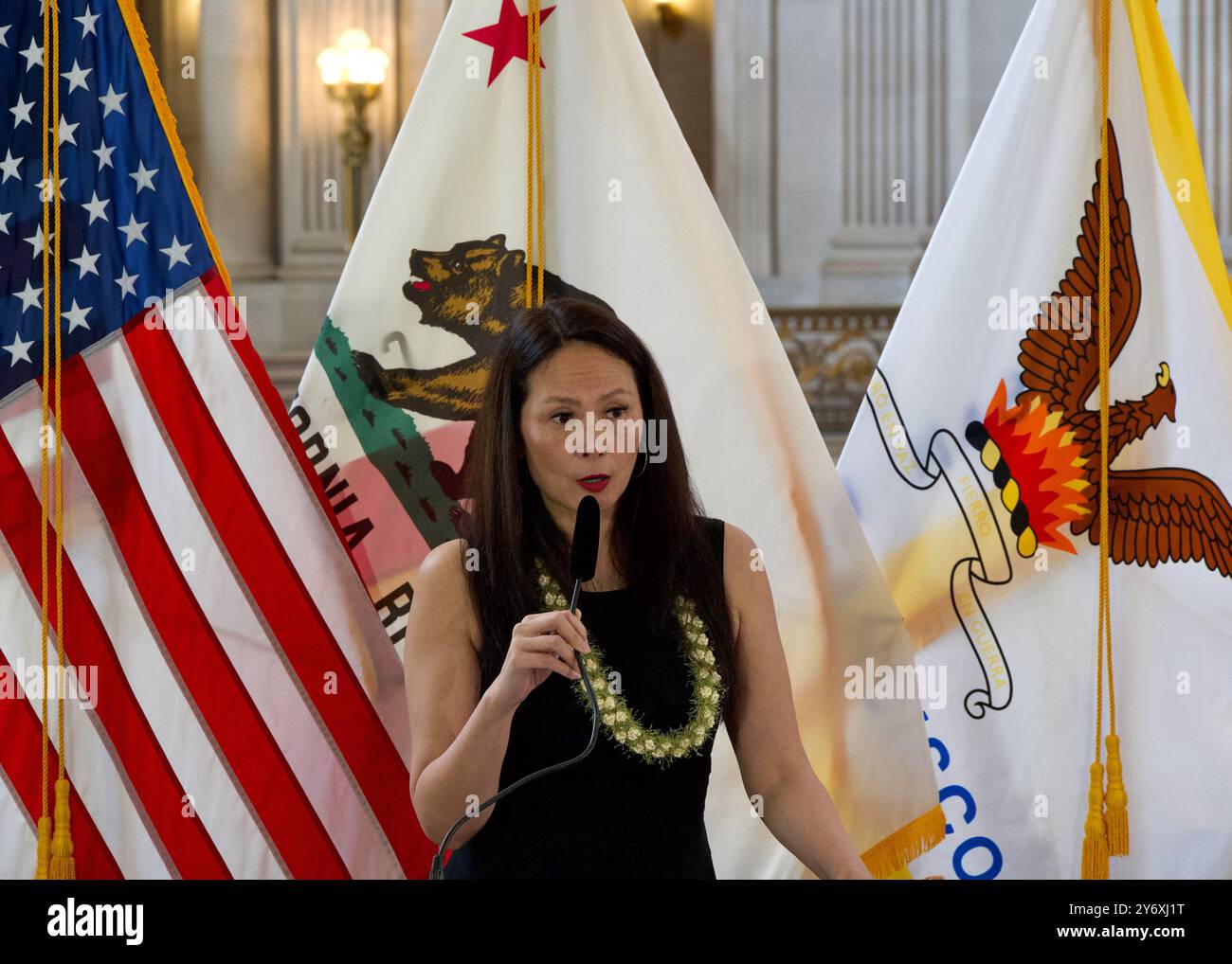San Francisco, CA - March 19, 2024: Jaynry Mak speaking at a Women’s ...