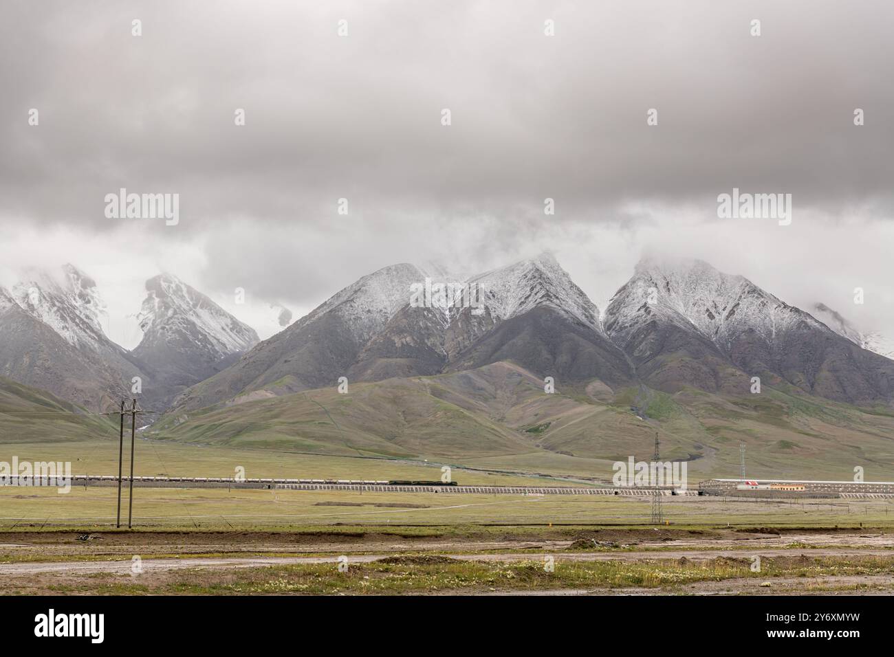 Trains on the Qinghai-Tibet Railway line under the Kunlun Yuzhufeng ...