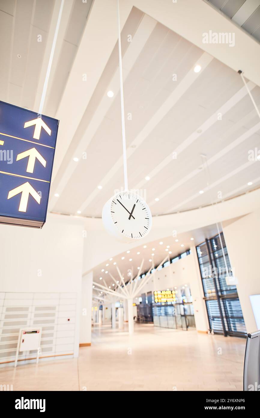 Airport, empty and waiting room with clock, hall and floor of terminal ...