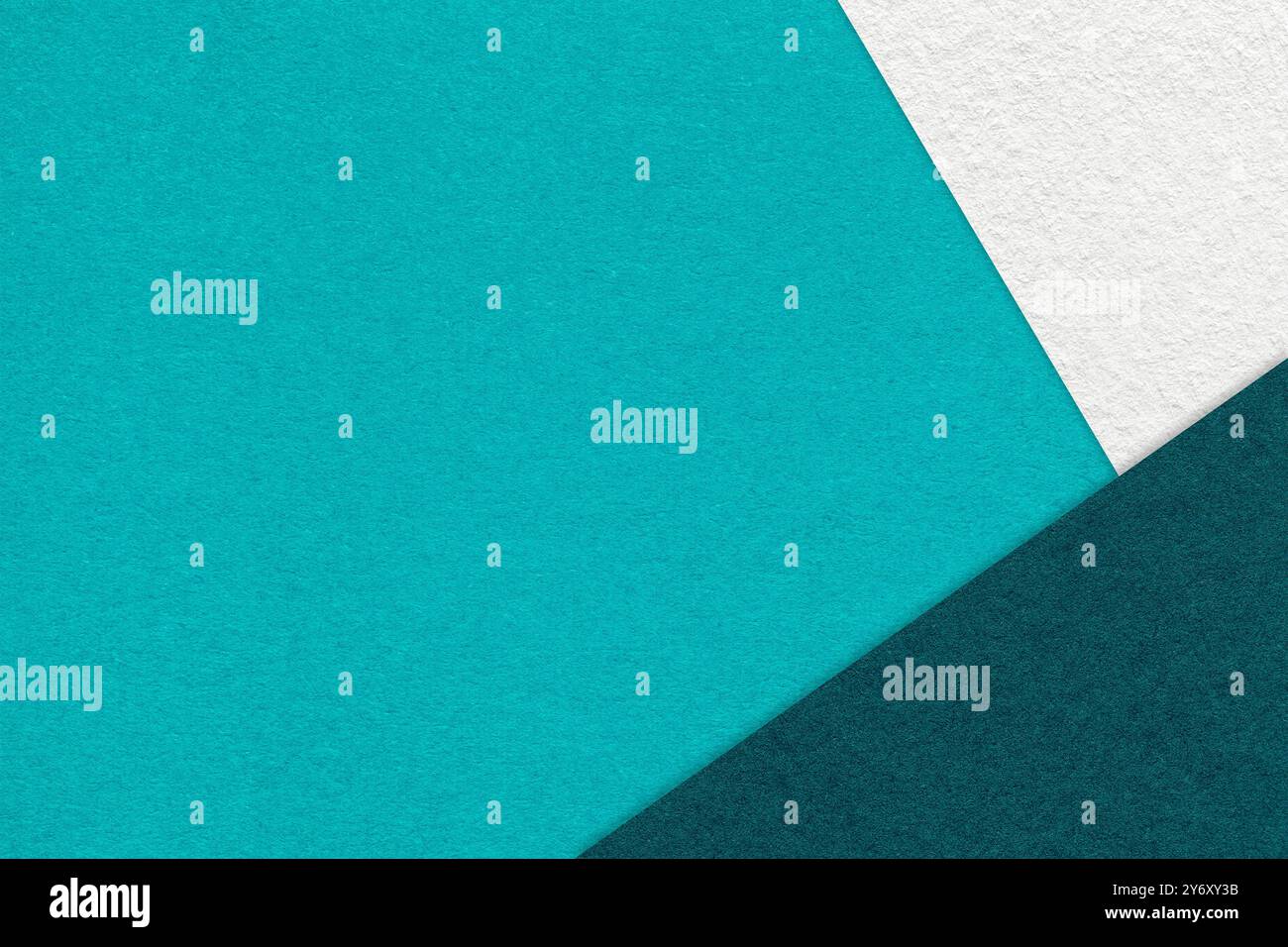 Texture of craft turquoise color paper background with white and ...