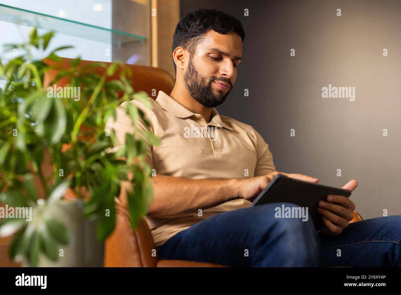In sleek office setting man hi-res stock photography and images - Alamy