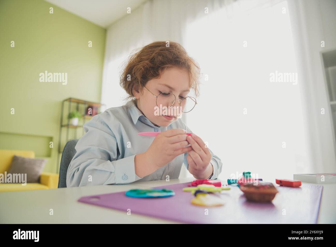 Photo of charming cute adorable learner girl sitting desktop make ...
