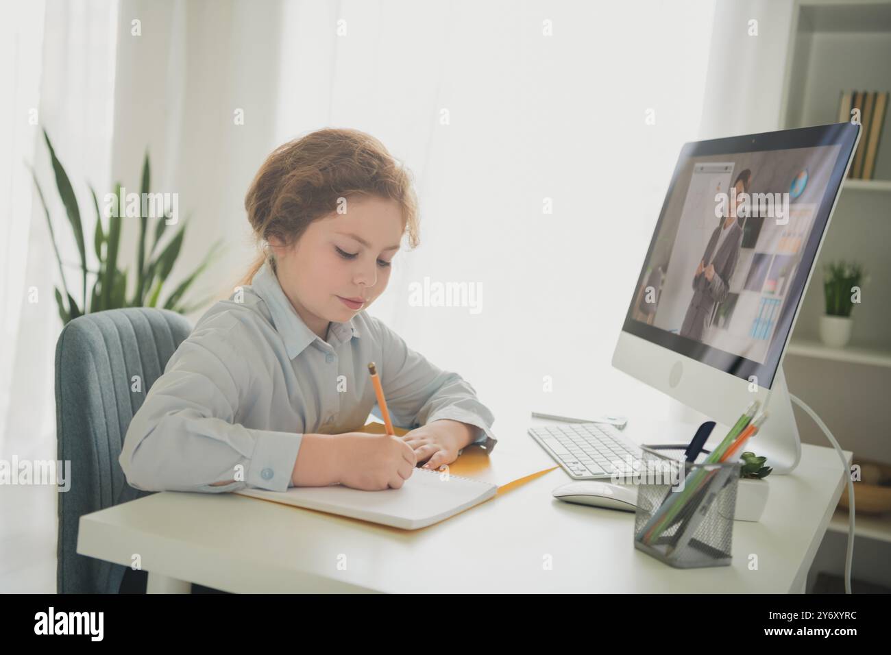 Photo of charming cute adorable clever girl learner wearing hometask ...