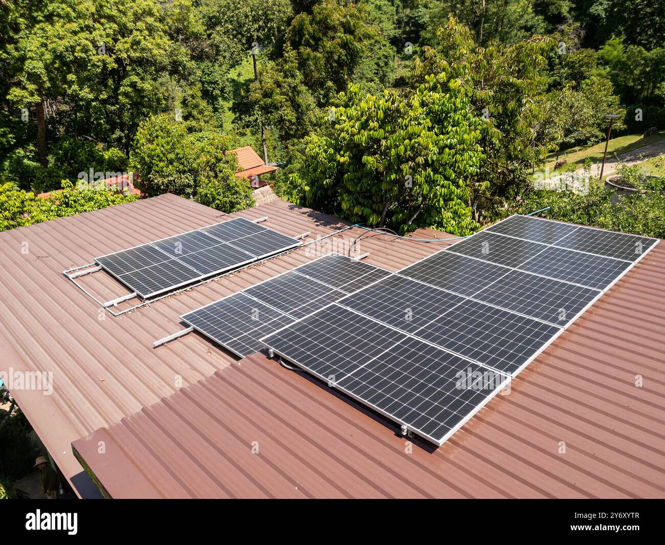 The solar panel on the rooftop of the local restaurant in the garden ...