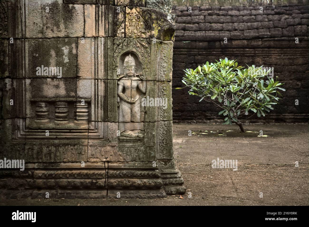 A relief of apsara figure on a corner of Banteay Prei Nokor, an ancient ...