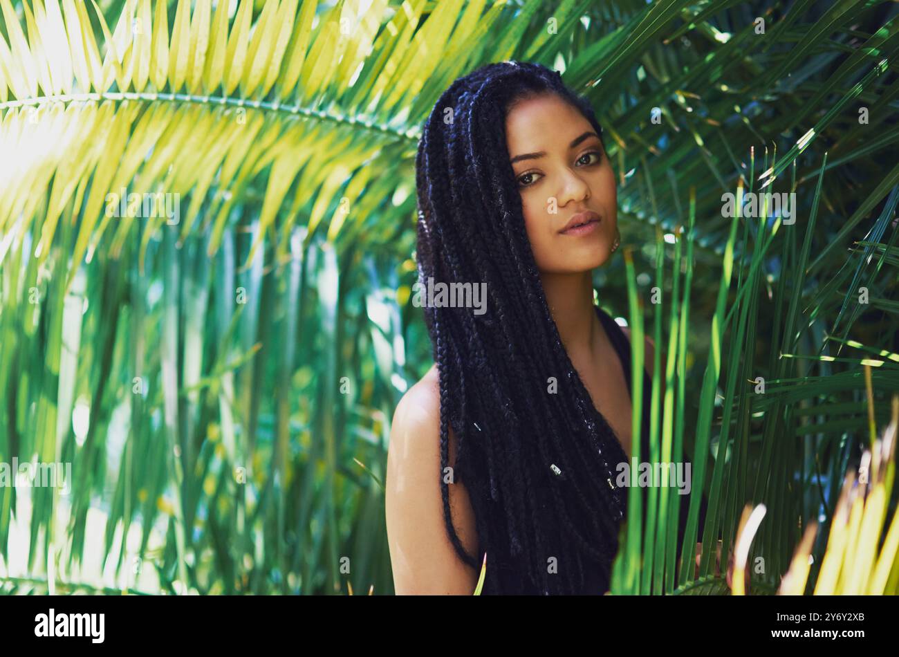 Woman, braids and portrait in nature for beauty, makeup and cosmetics ...