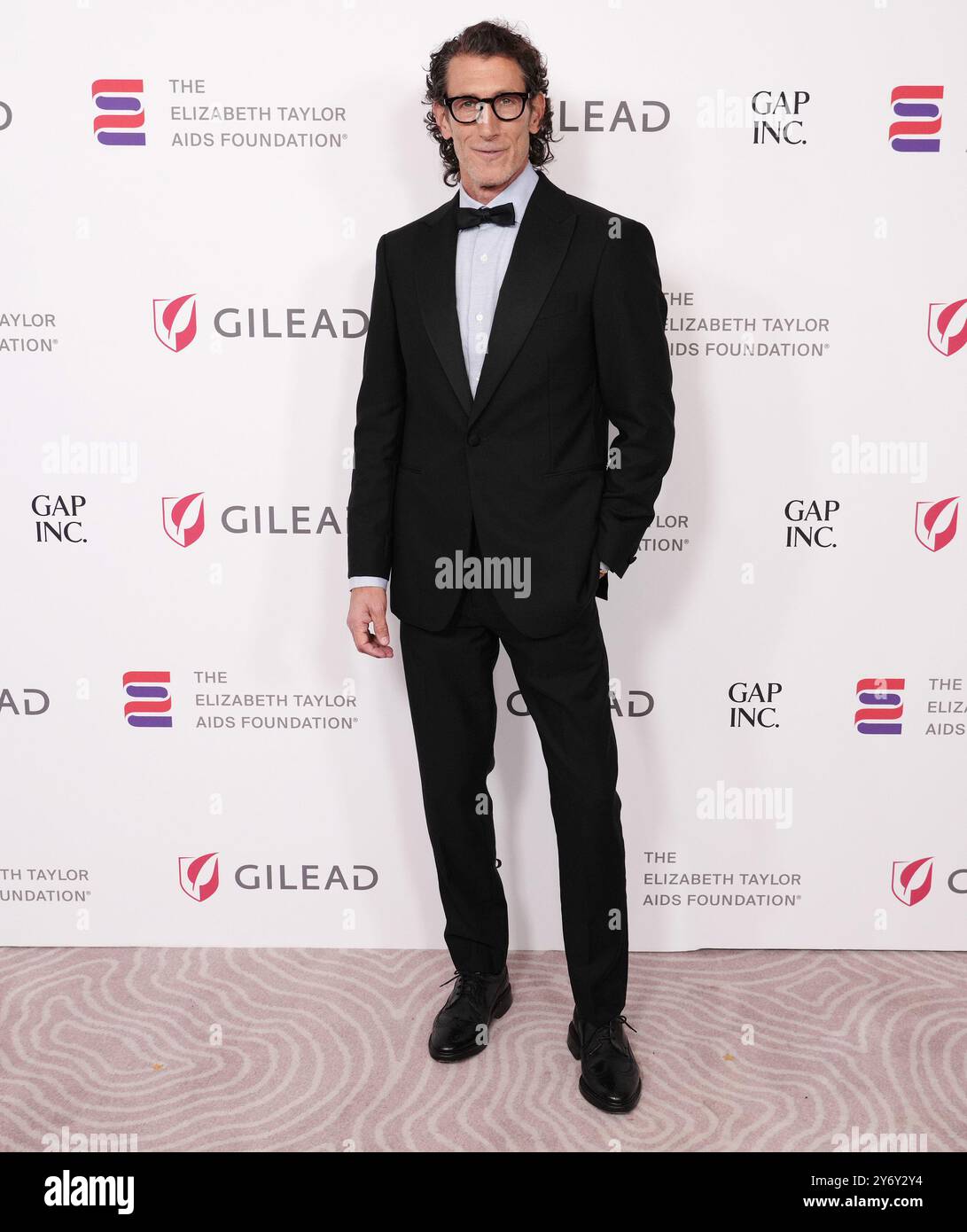 Richard Dickson arrives at The Elizabeth Taylor Ball To End AIDS held ...