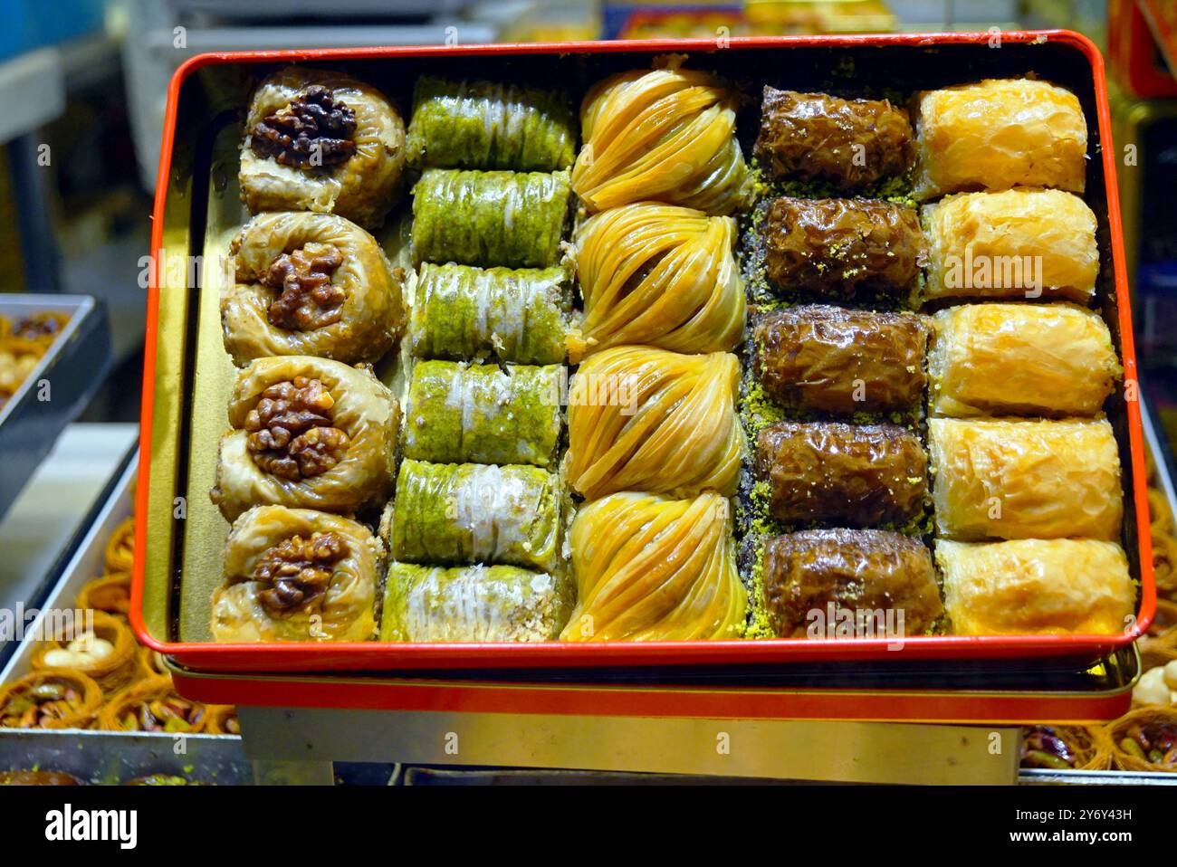 Gift set of Turkish sweets: an open box with five types of fresh nut ...